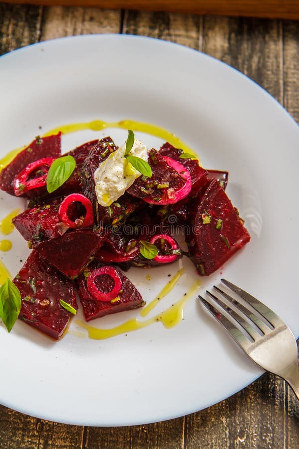 Salad of Baked Beet with Basil on a White Plate Top View Stock Photo ...