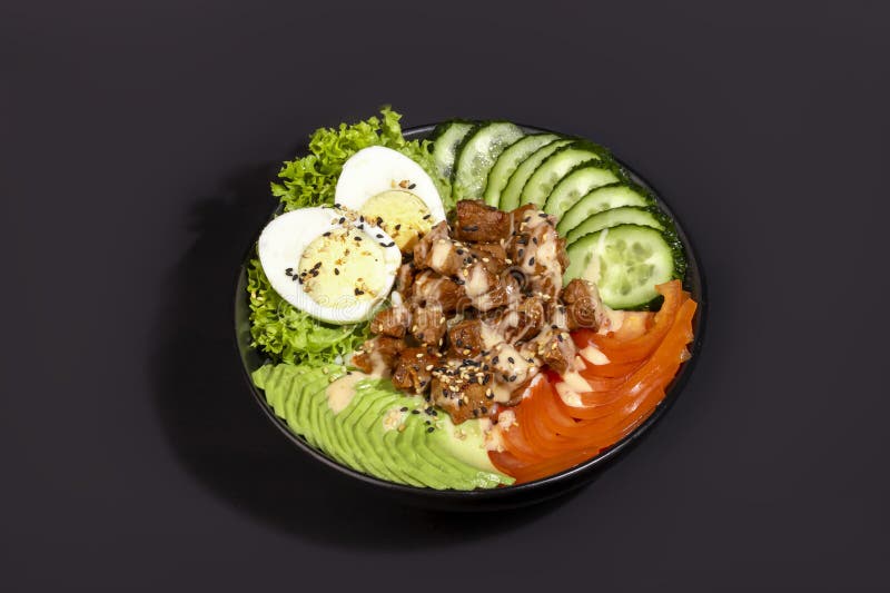Salad Bowl with Beef, Rice, Tomatoes, Cucumbers and Avocado. Boiled Egg ...