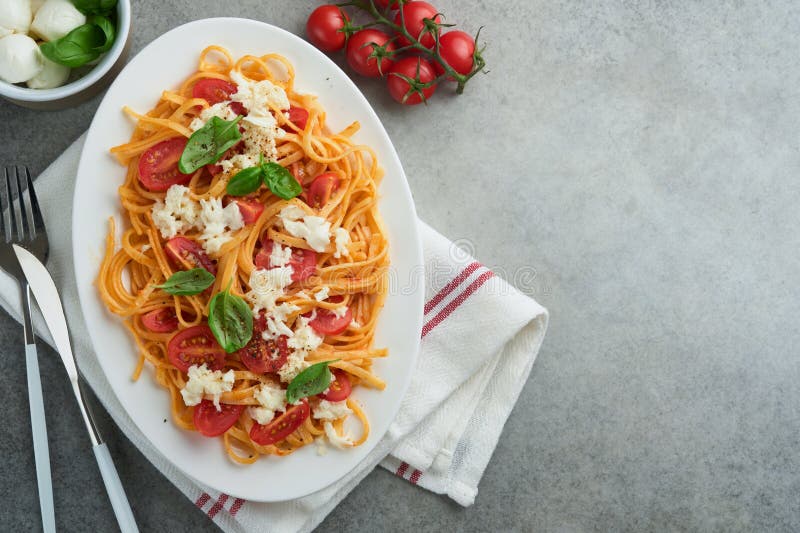 Salad Caprese or Pasta Spaghetti Broken with Basil and Mozzarella Ala ...