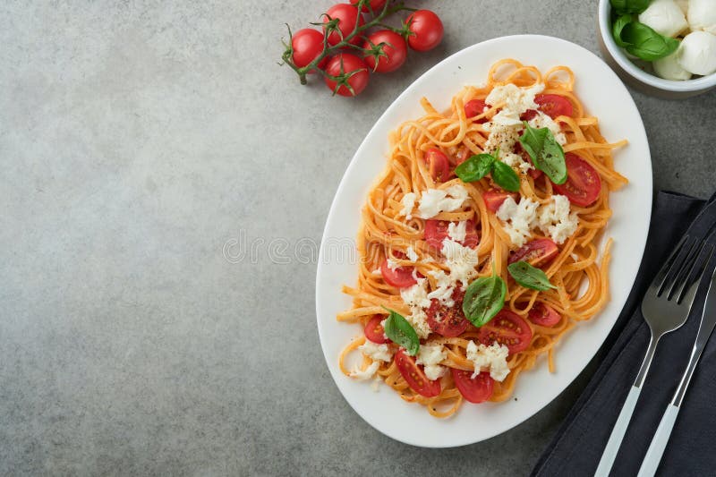 Salad Caprese or Pasta Spaghetti Broken with Basil and Mozzarella Ala ...