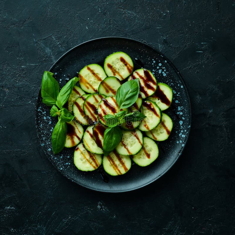 Salad of Fresh Cucumbers and Basil. Stock Photo - Image of slices ...