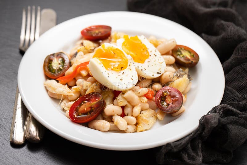 Salad with Fried Cod Fish and White Beans on the Plate. Stock Image ...