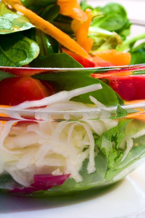 Salad in glass bowl stock photo. Image of transparent - 10857922
