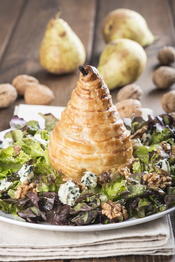 Salad of Nut Lettuce with a Pear in Puff Pastry Stock Image - Image of ...