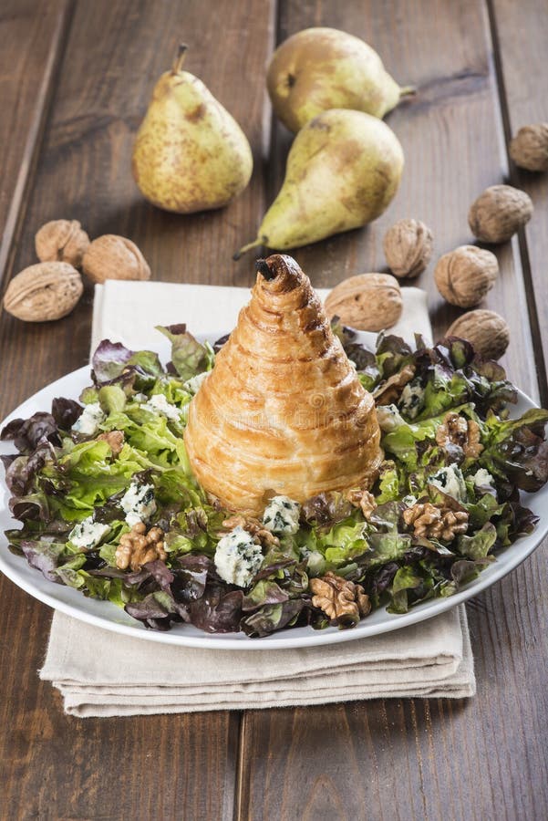 Salad of Nut Lettuce with a Pear in Puff Pastry Stock Photo - Image of ...