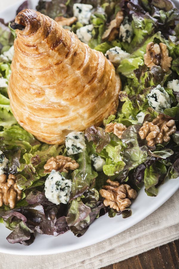 Salad of Nut Lettuce with a Pear in Puff Pastry Stock Photo - Image of ...