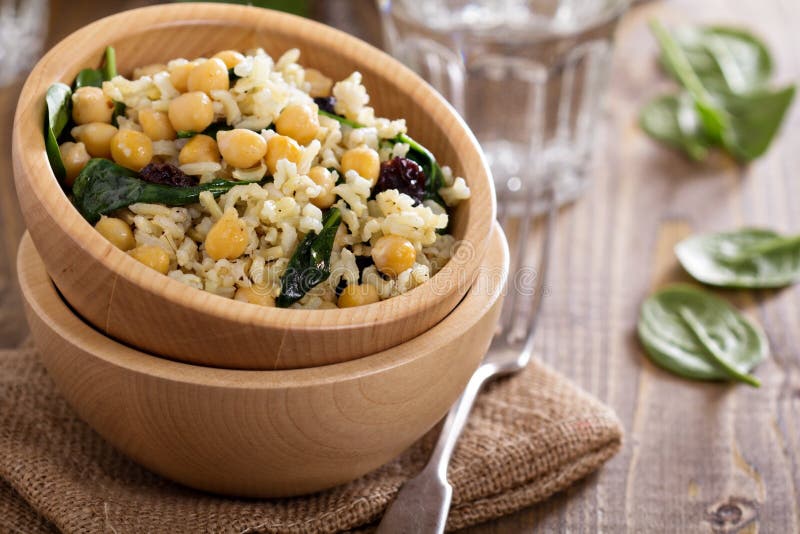Salad with Rice, Chickpeas, Spinach, Raisins Stock Photo - Image of ...