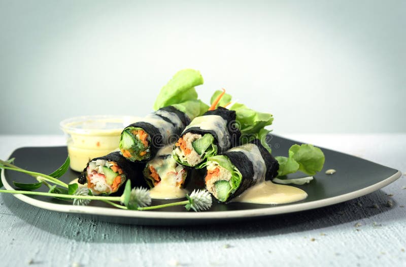 Salad roll in black dish stock image. Image of lettuce - 254548167