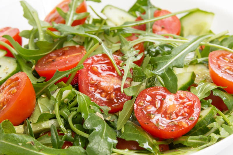 Salad from Ruccola, Cherry Tomatoes and Cucumber Stock Photo - Image of ...