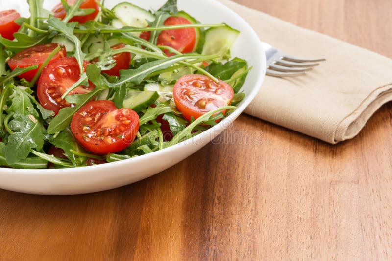 Salad from Ruccola, Cherry Tomatoes and Cucumber Stock Photo - Image of ...