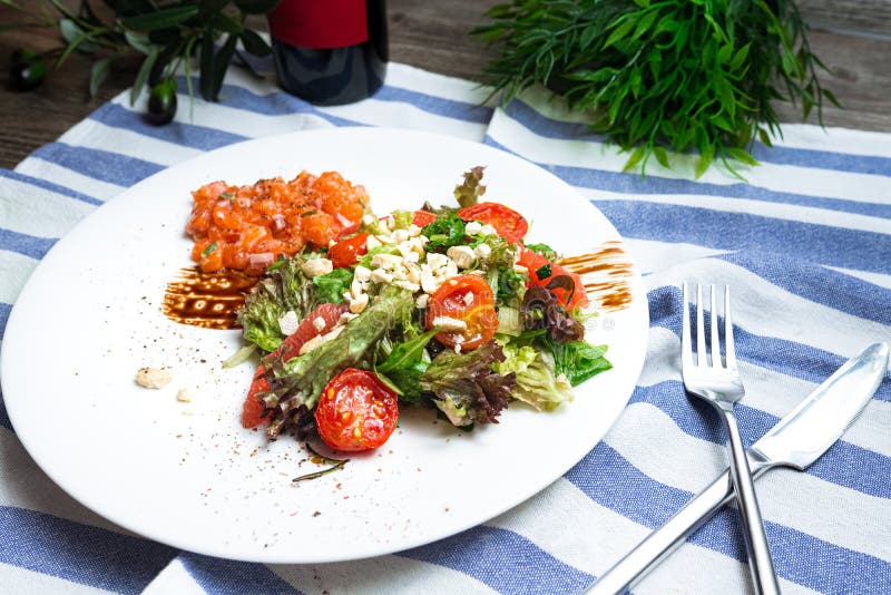 Salad with Salmon, Crushed Cashew Nuts, Cherry Tomatoes Stock Image ...