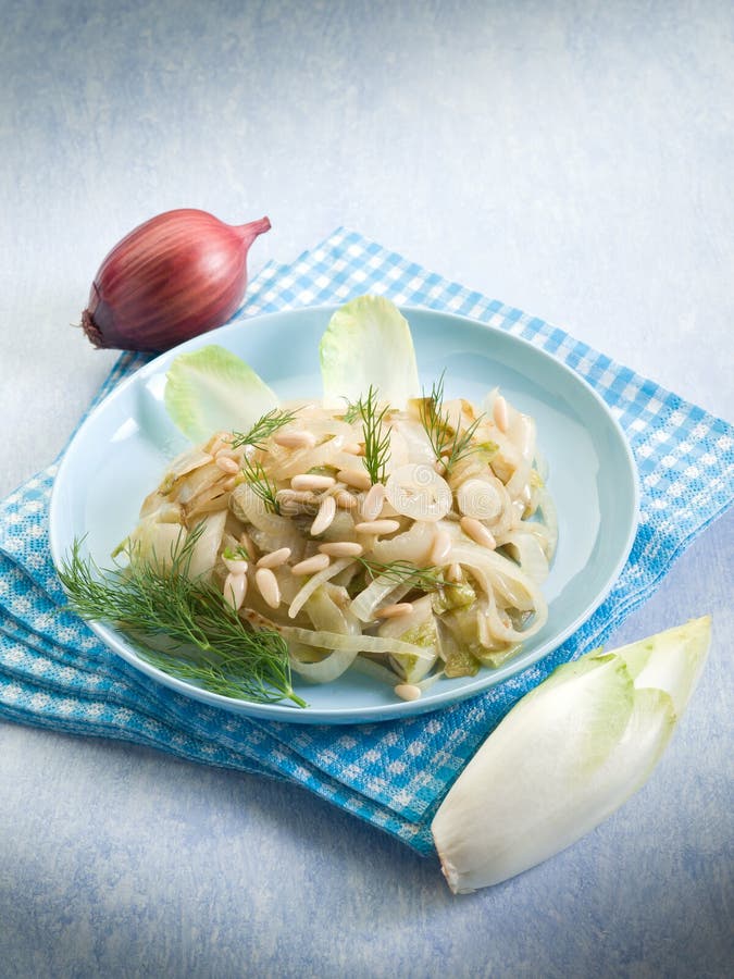 Salad with sauteed endive stock image. Image of onion - 22899617