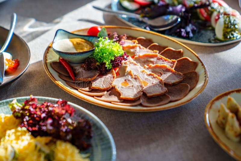 Salads and Cold Cuts. a Table Served with Utensils and Snacks for Lunch ...