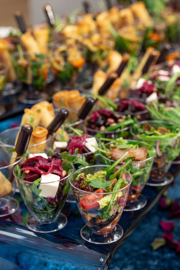 Salads and Snacks in Plastic Cups on the Buffet Stock Image - Image of ...