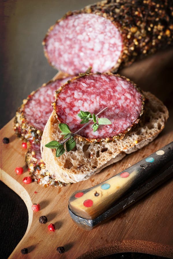 Salami with bread stock image. Image of gourmet, delicious - 37617473