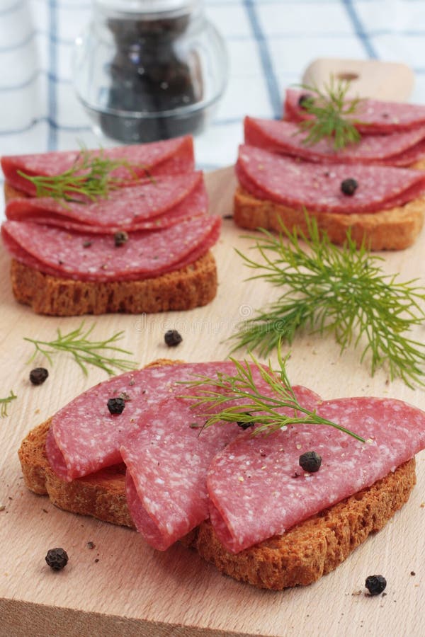 Salami on wholemeal bread stock image. Image of lifestyle - 23197033