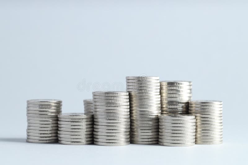 Salary Concept. Stacked Coins on Light Grey Background Stock Photo ...