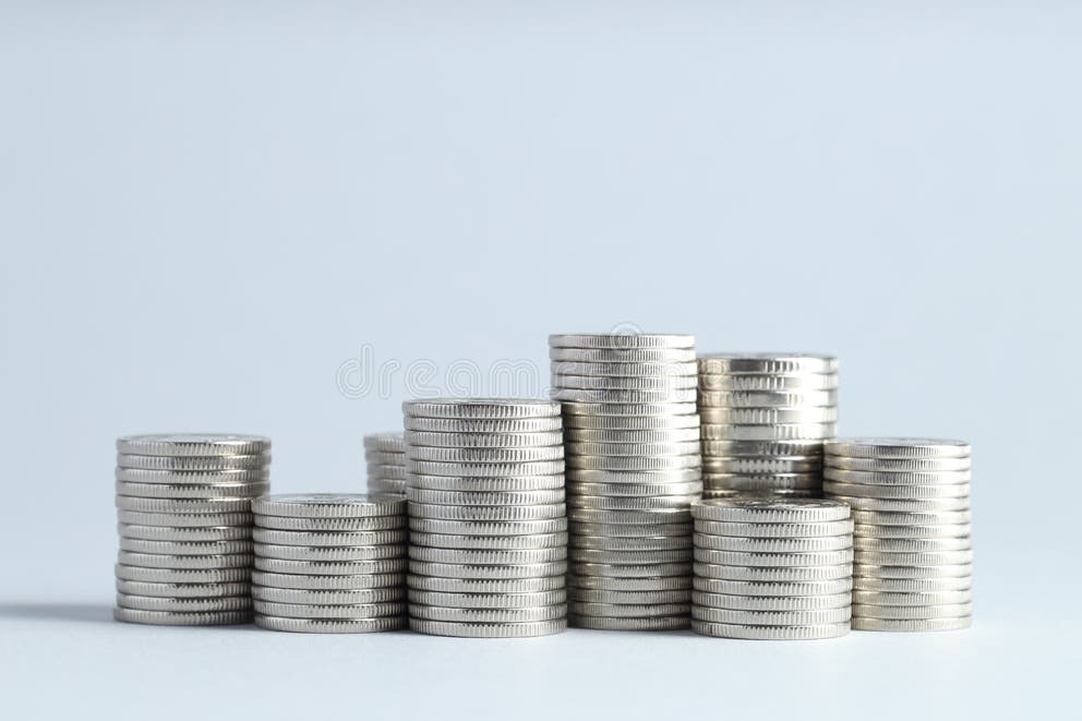 Salary Concept. Stacked Coins on Light Grey Background Stock Photo ...