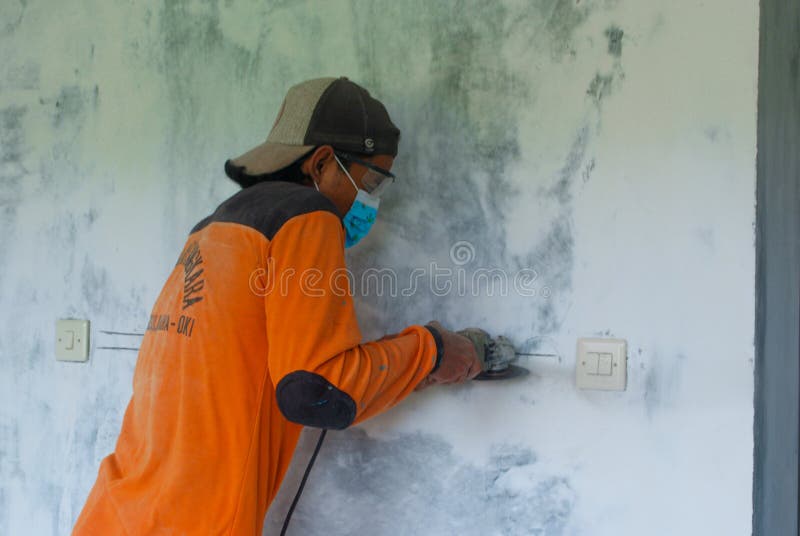 Construction Worker are Grinding the Walls Editorial Photo - Image of ...