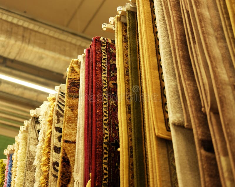 Assortment of Different Carpets in Store. Stock Photo - Image of ...
