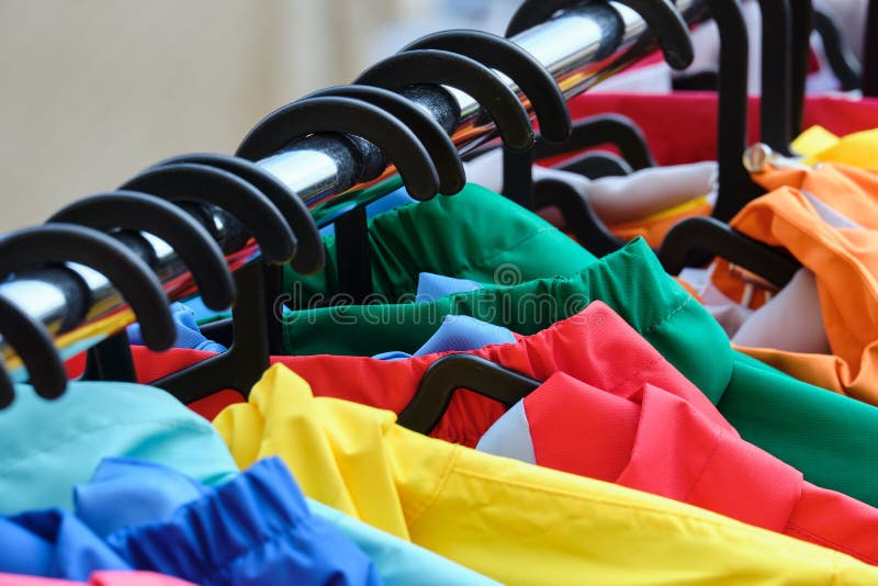 Sale of Autumn and Spring Clothes on the Hanger of the Fair Stock Photo ...