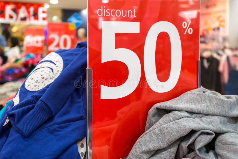 Sale Sign 50 in the Clothing Shop Stock Image - Image of fashion ...