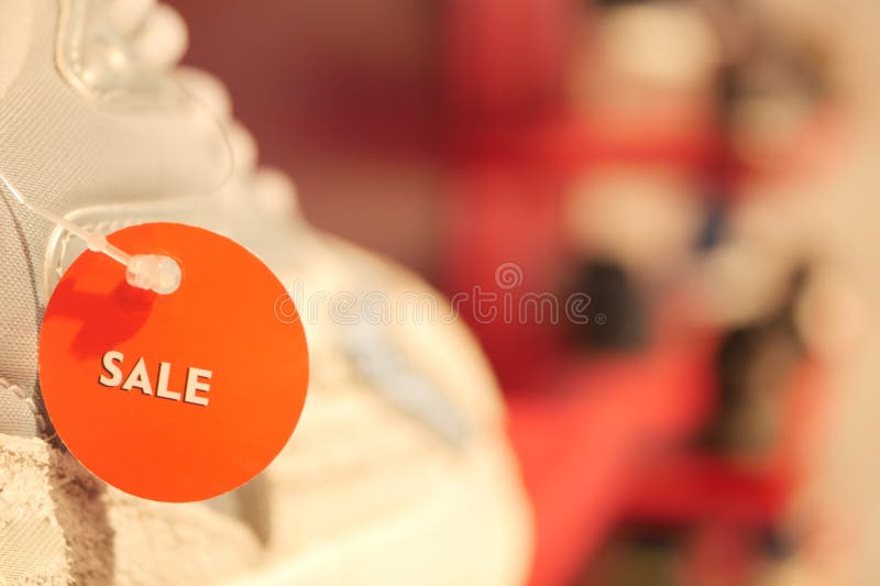 Sale Tag on Sneaker at Retail Store Display in Daytime Stock Image ...