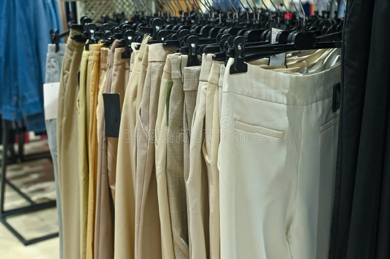 Sale of Trousers in a Clothing Store Stock Photo - Image of pants ...