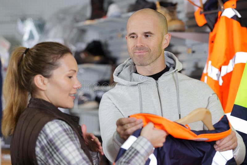 Sale Working Clothes for Builders Stock Photo - Image of clothes, shop ...