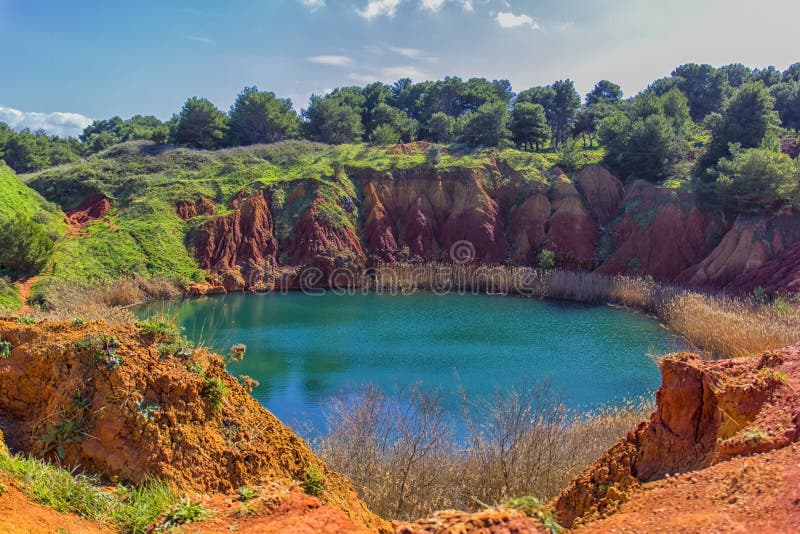 Salento: Otranto, Bauxite Quarry Stock Photo - Image of pond, view ...
