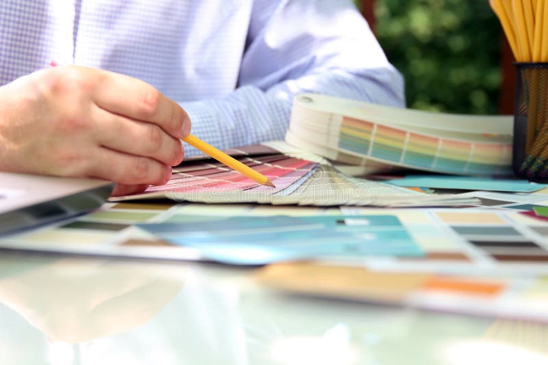 Sales Agent Choosing Color Samples for Design Project. Stock Photo ...