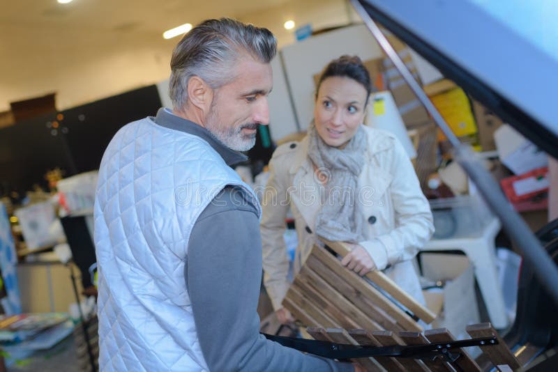 Sales Assistant at Department Store Helping Customer Stock Photo ...