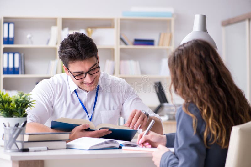 The Sales Assistant Discussing Transaction with Customer Stock Image ...
