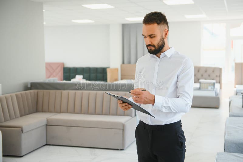 Sales Assistant in Furniture Store Stock Image - Image of living ...