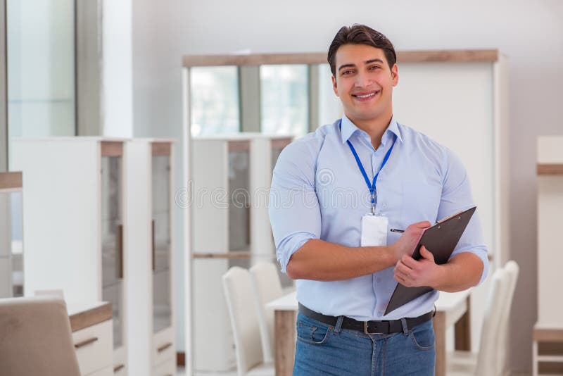 The Sales Assistant in Furniture Store Stock Image - Image of interior ...