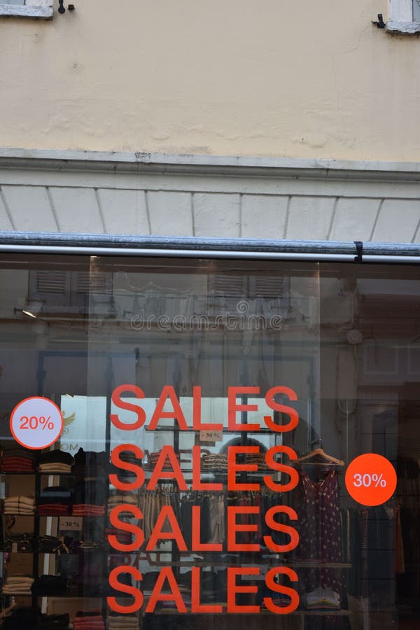 Sales in clothes store stock photo. Image of offer, clothes - 73858498