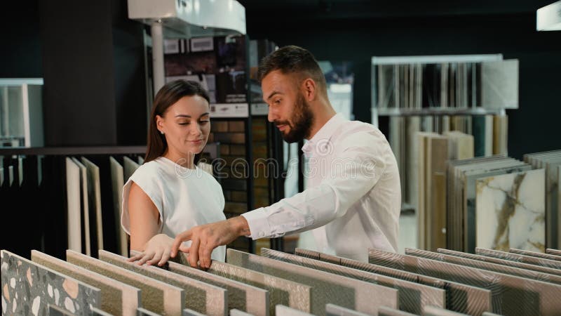 Sales Consultant Showing Customer Various Tile Samples Stock Video ...
