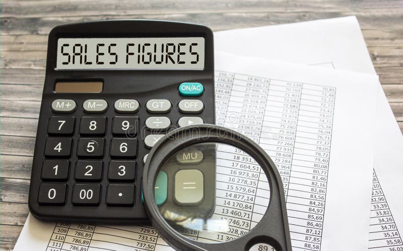 Sales Figures - Text on Calculator Next To Documents Stock Photo ...