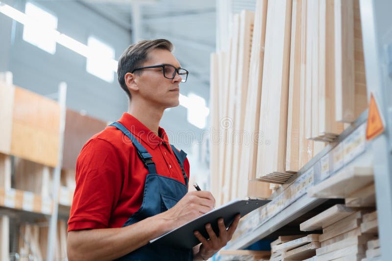 Sales Manager Making Notes on the Clipboard. Stock Photo - Image of ...