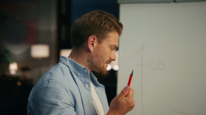 Sales Manager Pointing Whiteboard in Remote Workplace. Guy Explaining ...