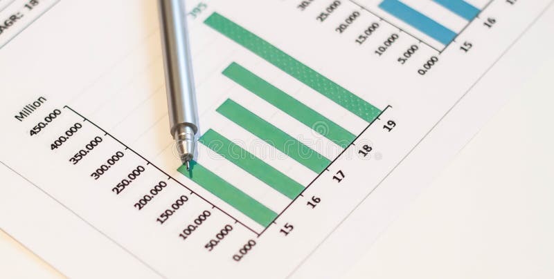 In the Sales Manager`s Office, Financial Statements and a Pen on the ...