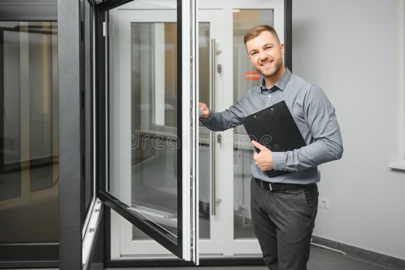 Sales Manager in a Window Shop. the Concept of Window Sales. Stock ... Sales Manager in a Window Shop. the Concept of Window Sales. Stock ...