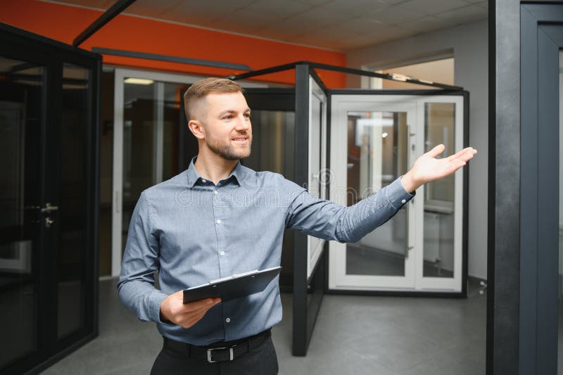 Sales Manager in a Window Shop. the Concept of Window Sales. Stock ...