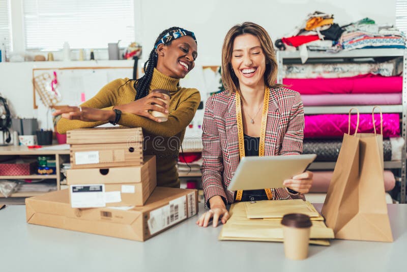 Working Women at Their Store. they Accepting New Orders Online and ...