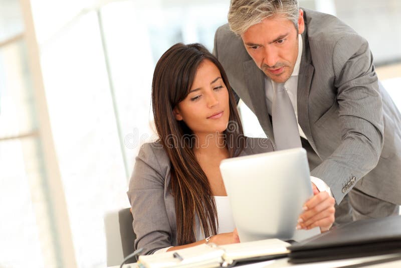 Sales People Working with Tablet Stock Photo - Image of office ...