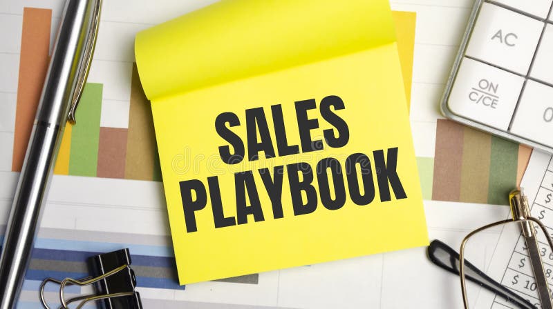 Sales Playbook Text on the Yellow Paper with Pen and Glasses Stock ...