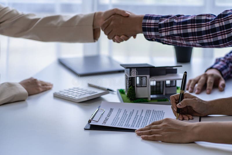 Sales Representatives Shake Hands with Customers and Offer Home ...