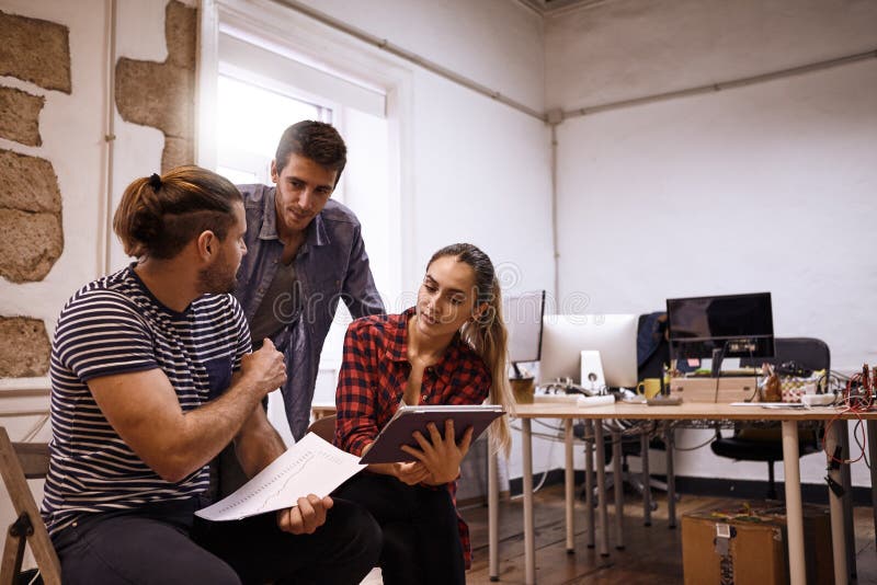 Sales Team of Three Young Representatives Stock Photo - Image of ...