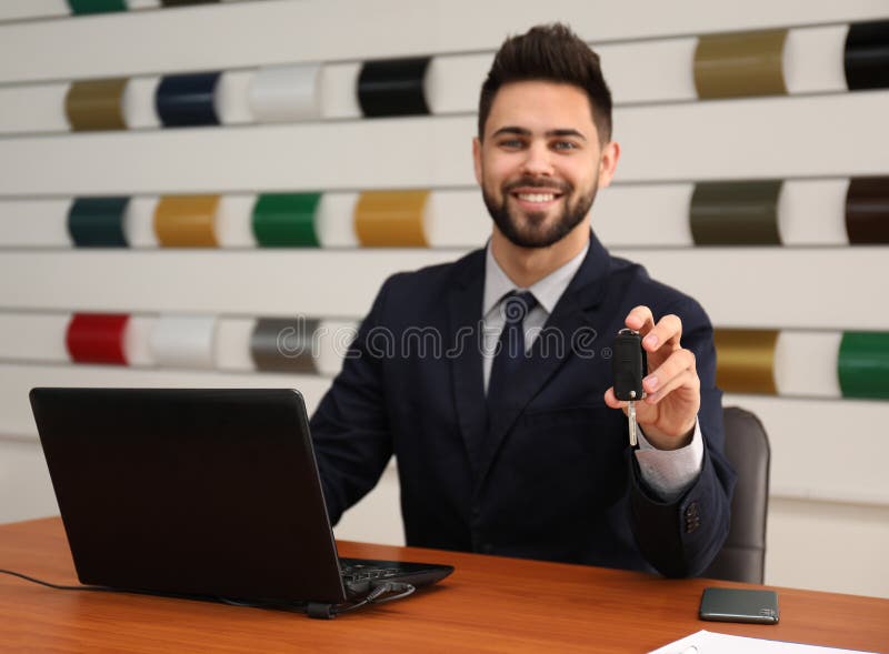 Salesman with Car Key at Desk Stock Photo - Image of caucasian, lease ...