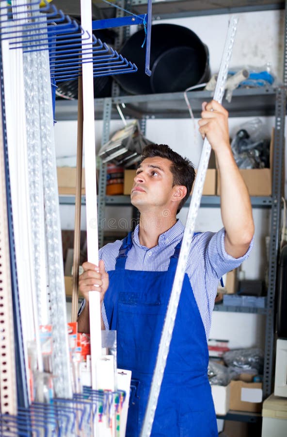 Salesman is Checking Ceiling Stock Photo - Image of adult, rows: 241799802